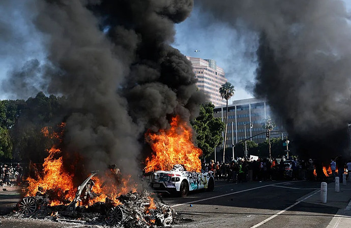 Trump Protest Turns Violent: Waymo Robotaxis Set on Fire in LA